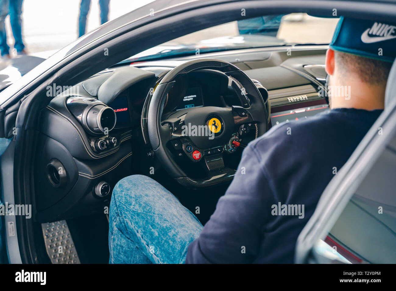 Valencia,Spain - March 30, 2019: Sitting in a Ferrari. Man in a ...
