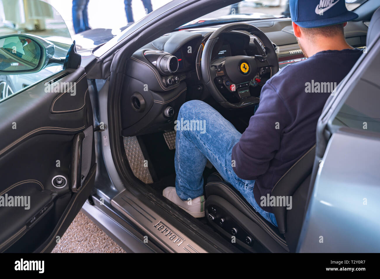 Valencia,Spain - March 30, 2019: Sitting in a Ferrari. Man in a ...