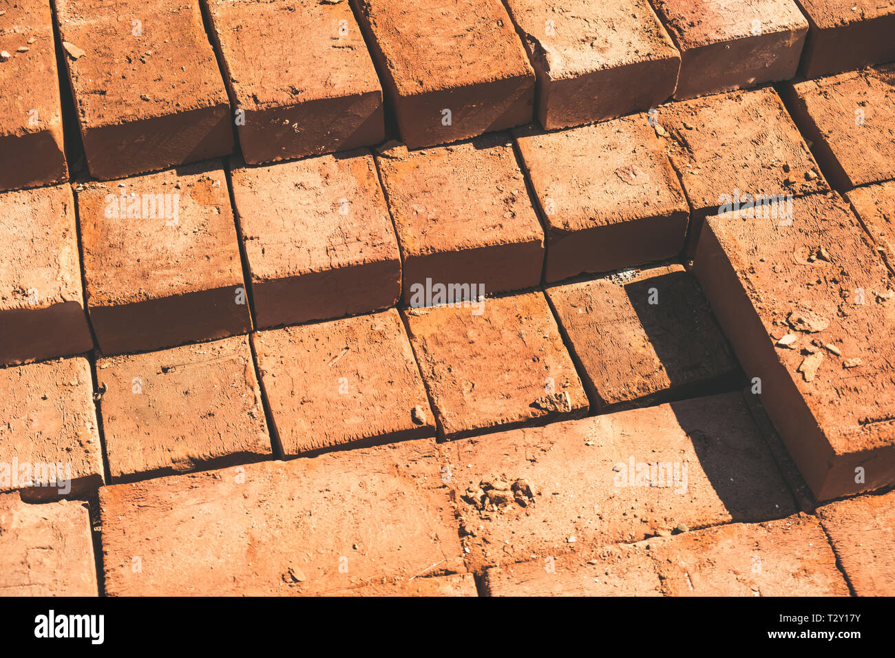 Pile of building bricks ready to be installed Stock Photo - Alamy