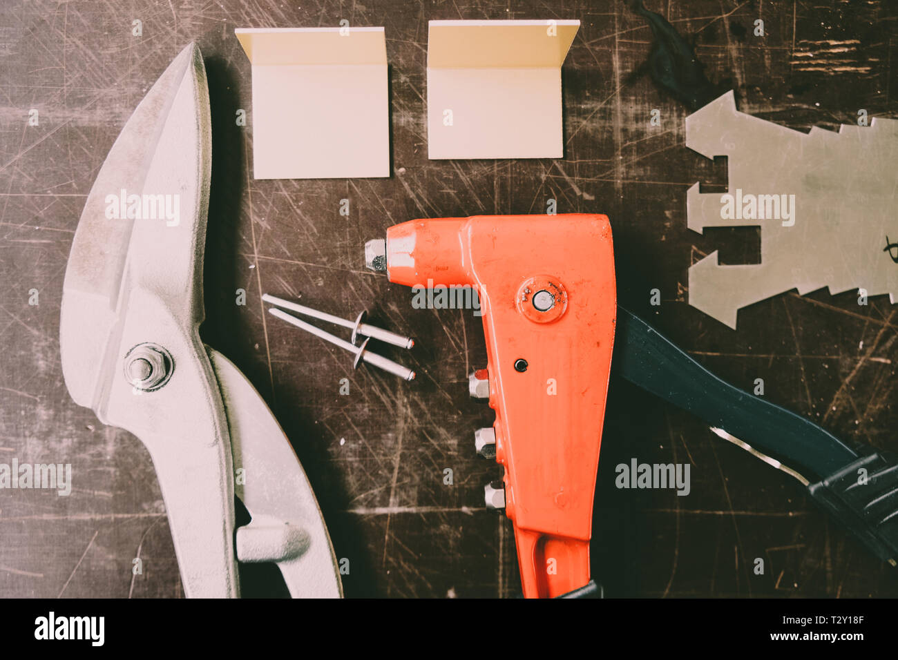 Tinsmith tools on the working table Stock Photo - Alamy