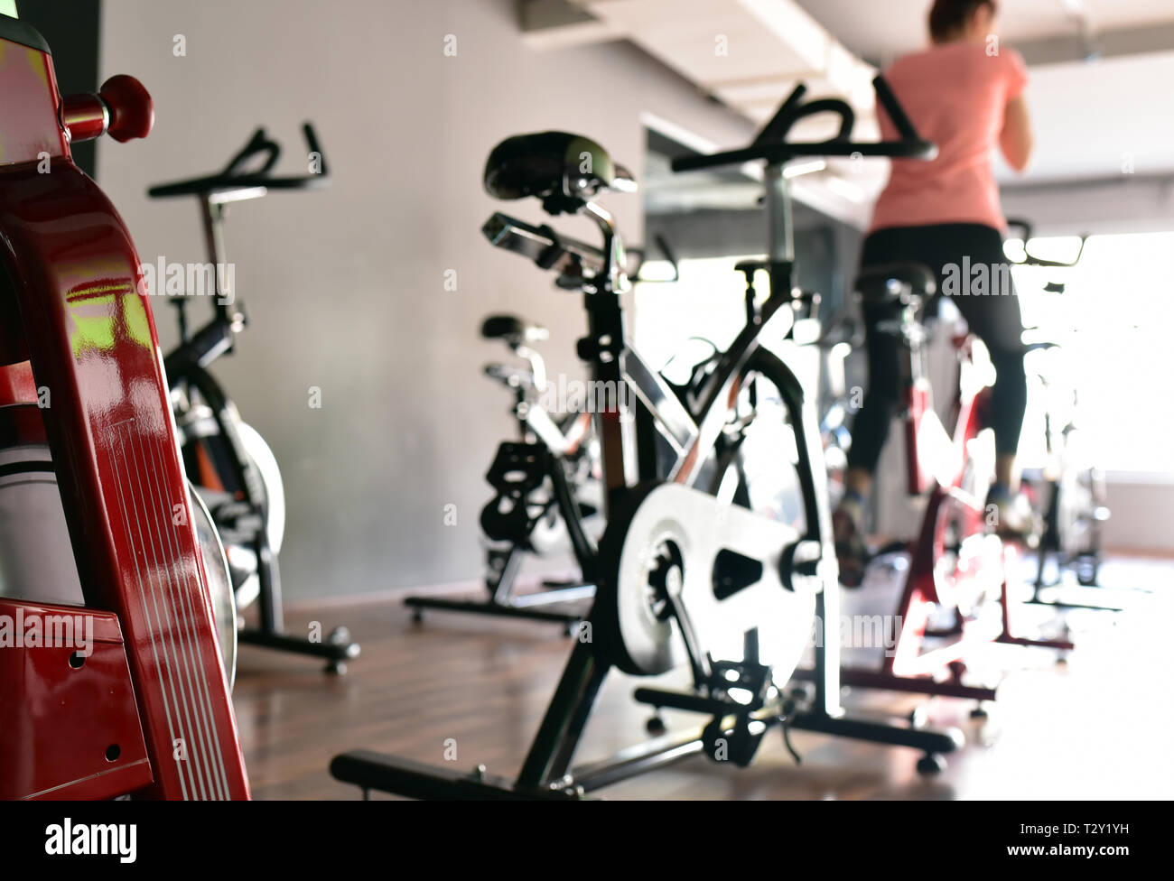 Fit woman working out at spinning class in Gym Stock Photo - Alamy