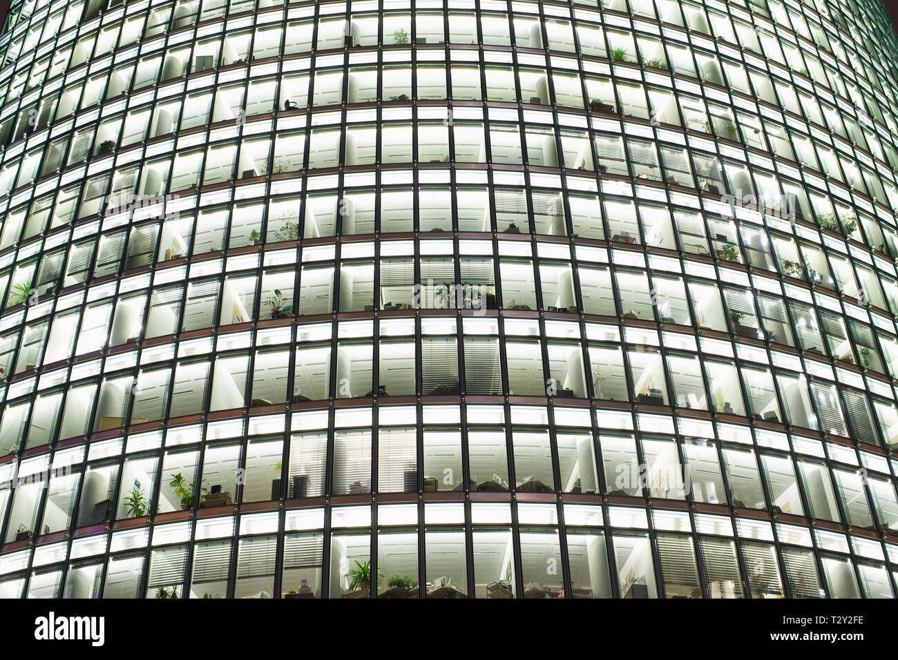 Modern office block at night Stock Photo - Alamy