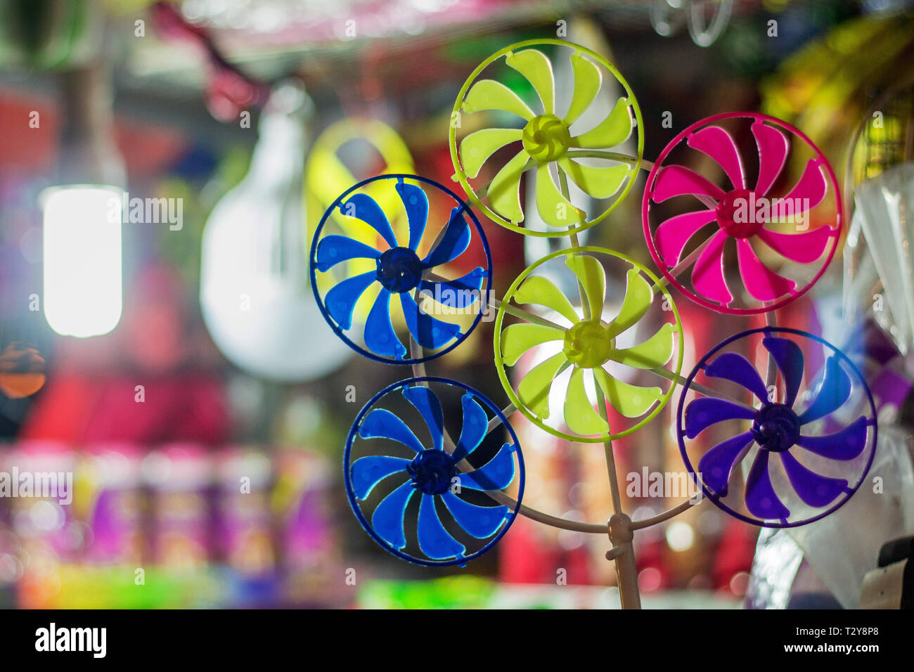 wind spinned Classical and colorful pinwheel with isolated background ...