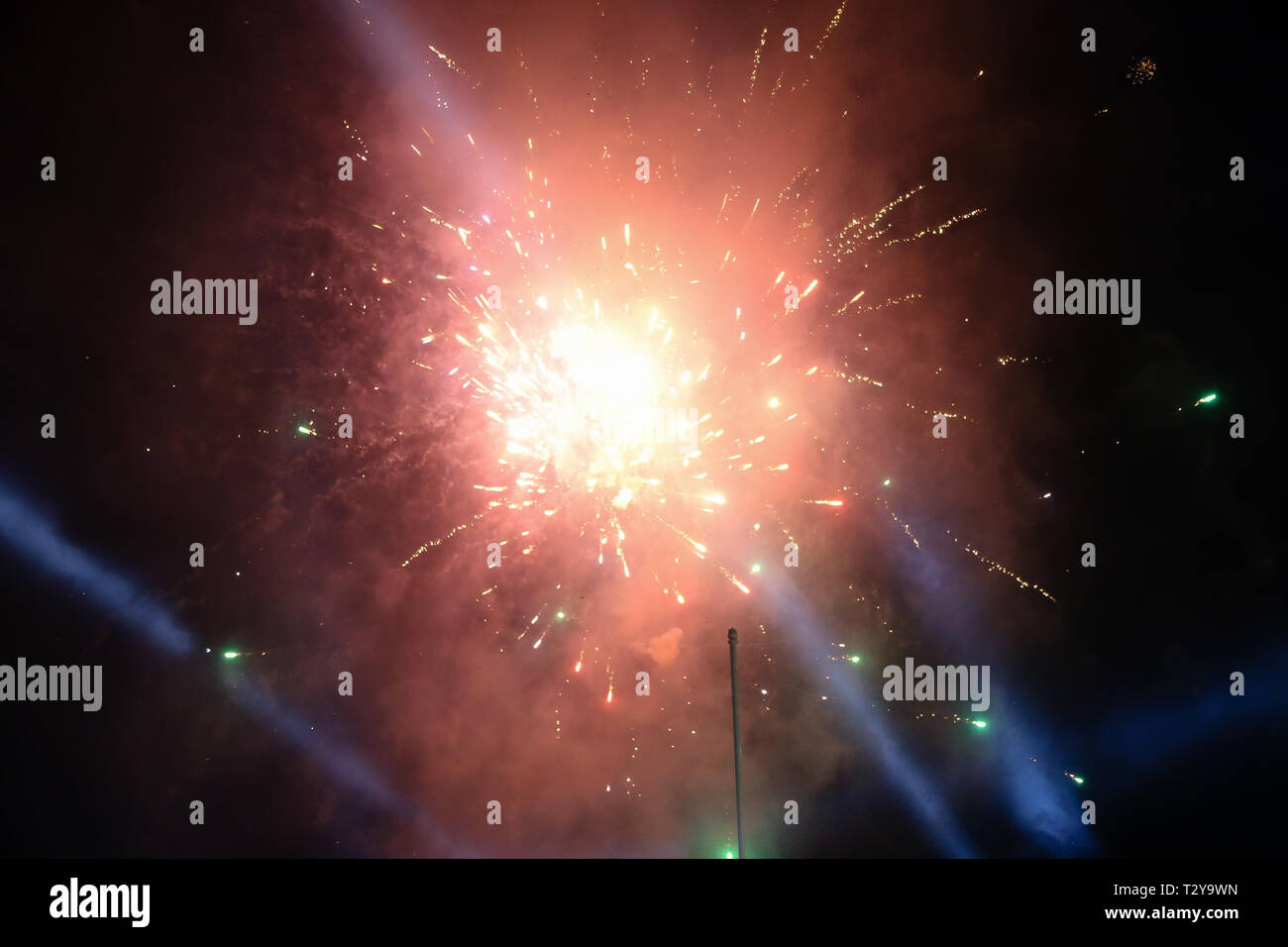 Bursting Fireworks and lighting Stock Photo - Alamy