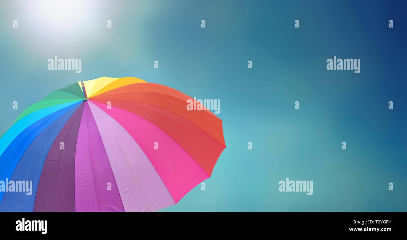 Blue sky under rainbow hi-res stock photography and images - Alamy