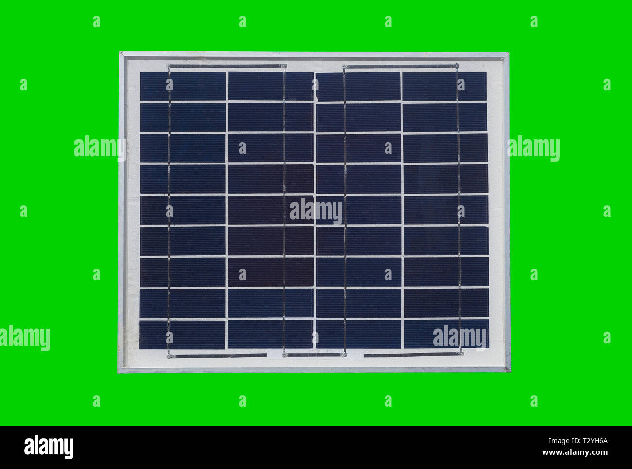 small solar panel on green background Stock Photo - Alamy