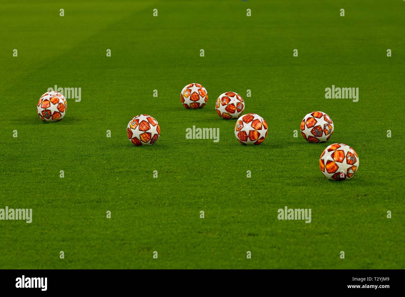 Match balls of the Champions League CL on grass, Allianz Arena, Munich ...