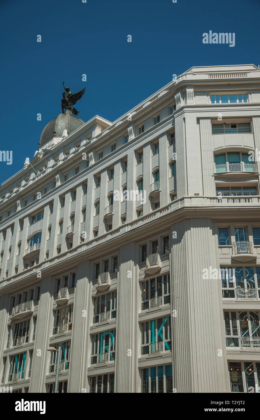 Facade with flamboyant decoration on old buildings full of windows in ...