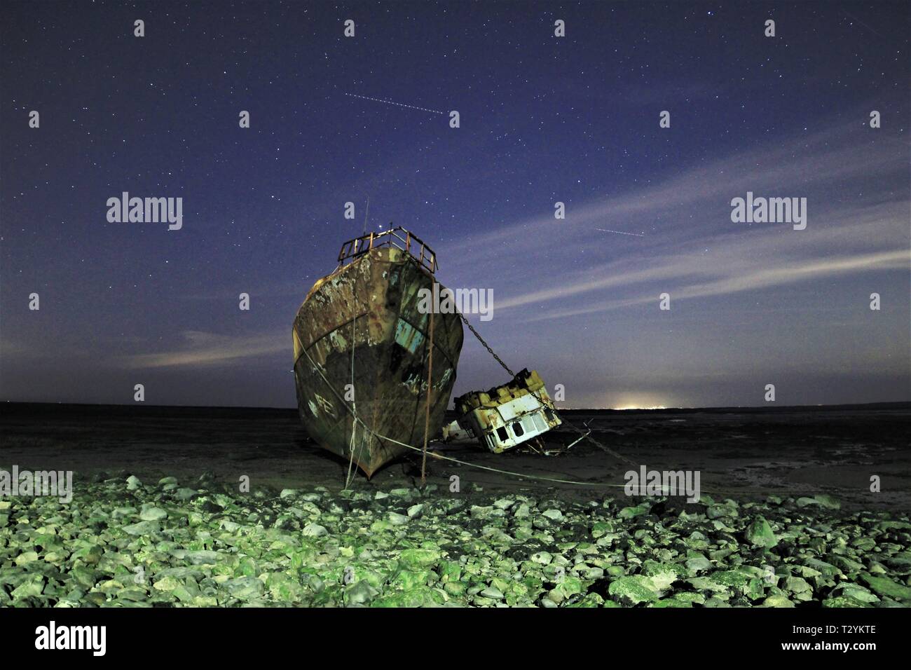 UK Rampside, Cumbrian Coast. Stars with clear sky above the derelict ...