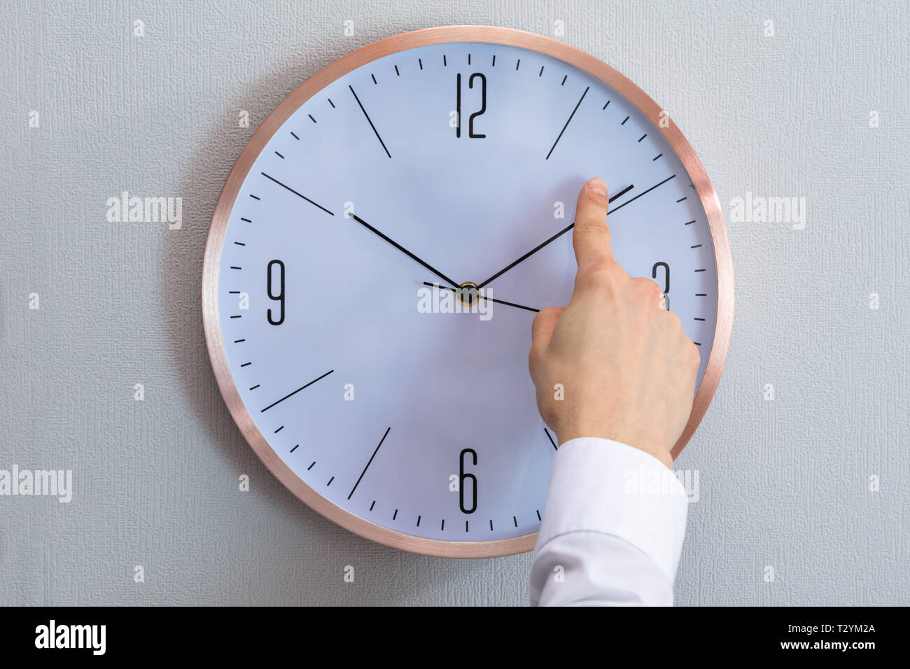 Male arm clock hi-res stock photography and images - Alamy