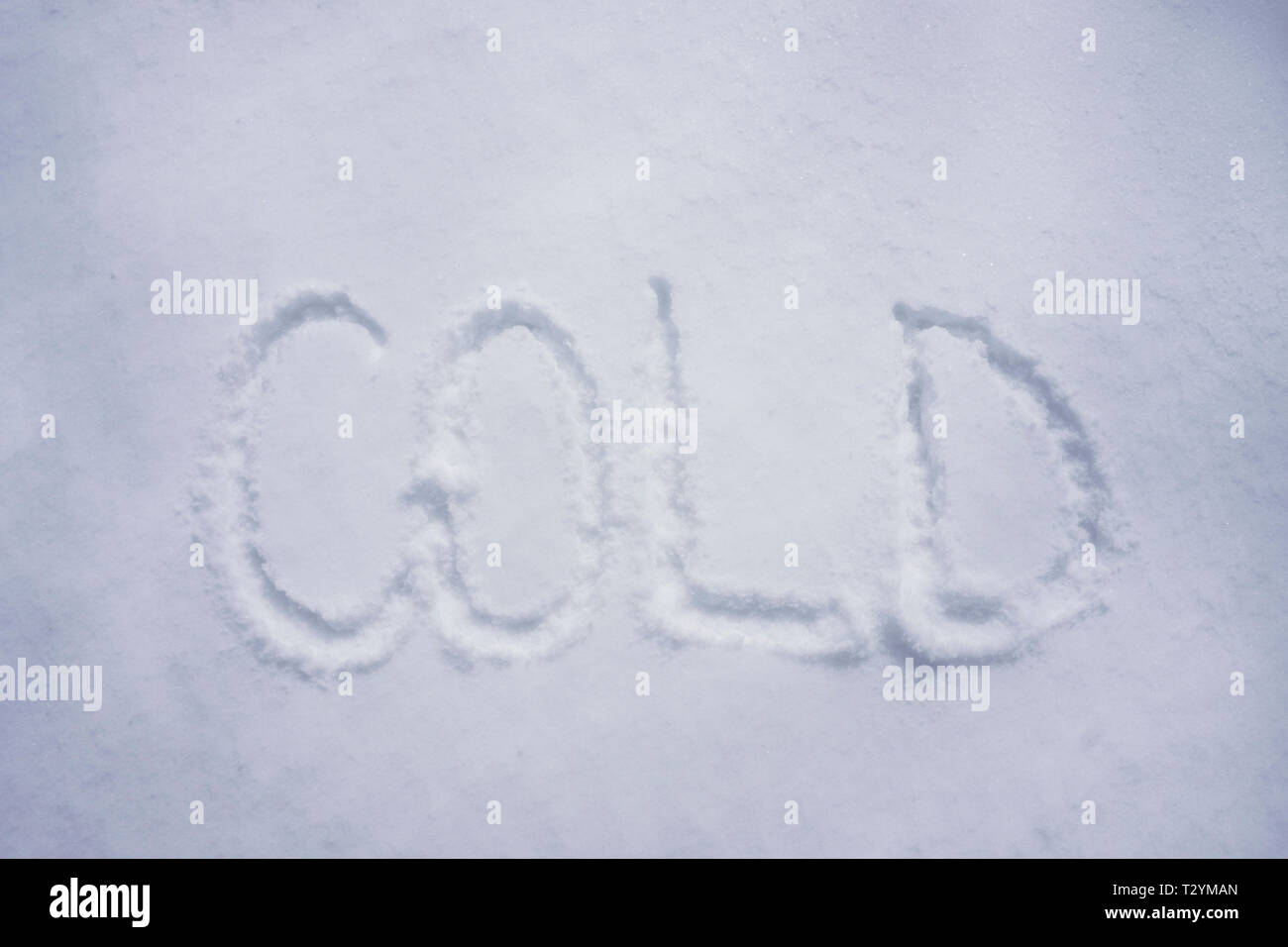 Cold word written in snow background Stock Photo - Alamy