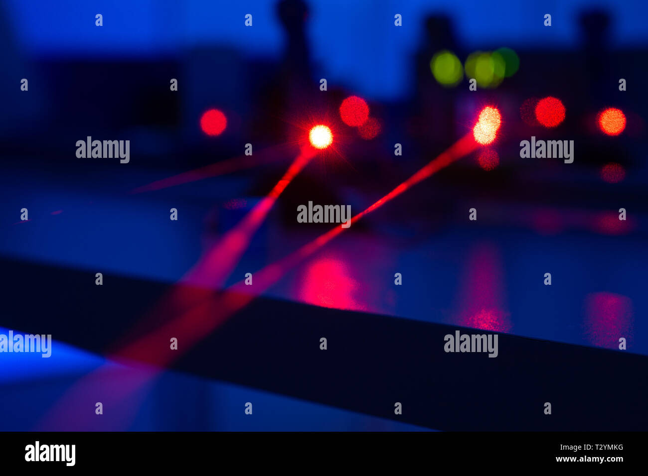Experiment with a red laser in a physics lab Stock Photo - Alamy