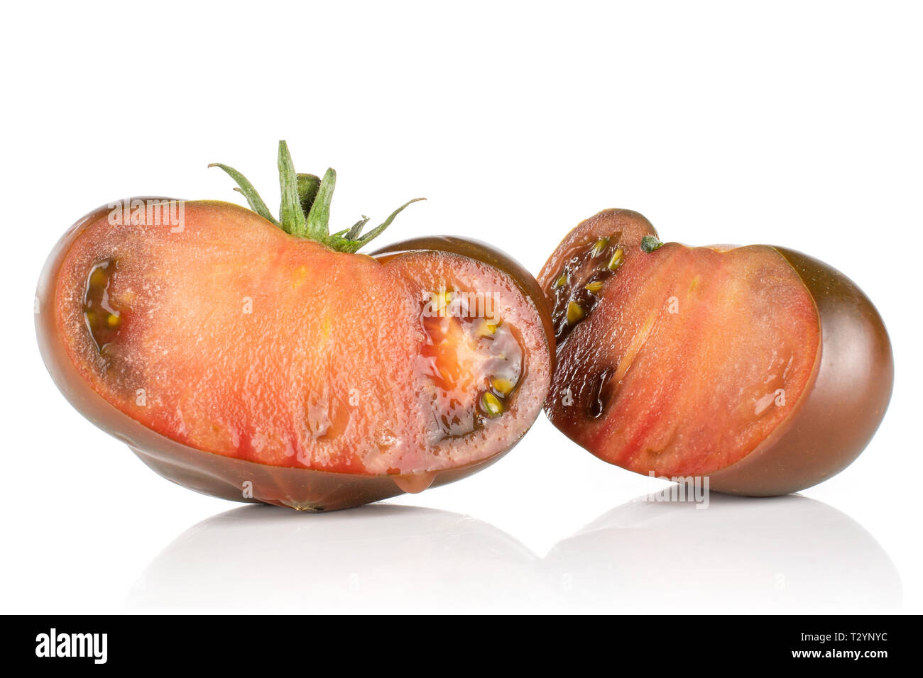 Group of two halves of fresh tomato primora isolated on white ...