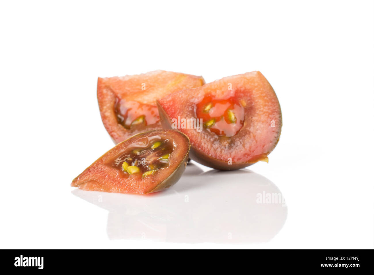 Group of three slices of fresh tomato primora isolated on white ...