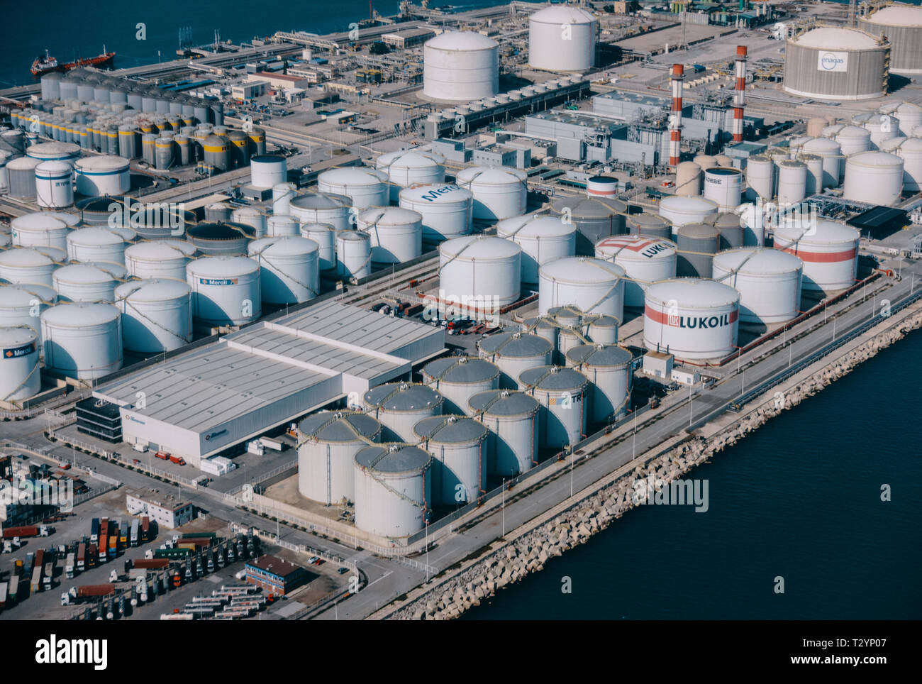 Fuel storage silos at the Port of Barcelona Stock Photo - Alamy