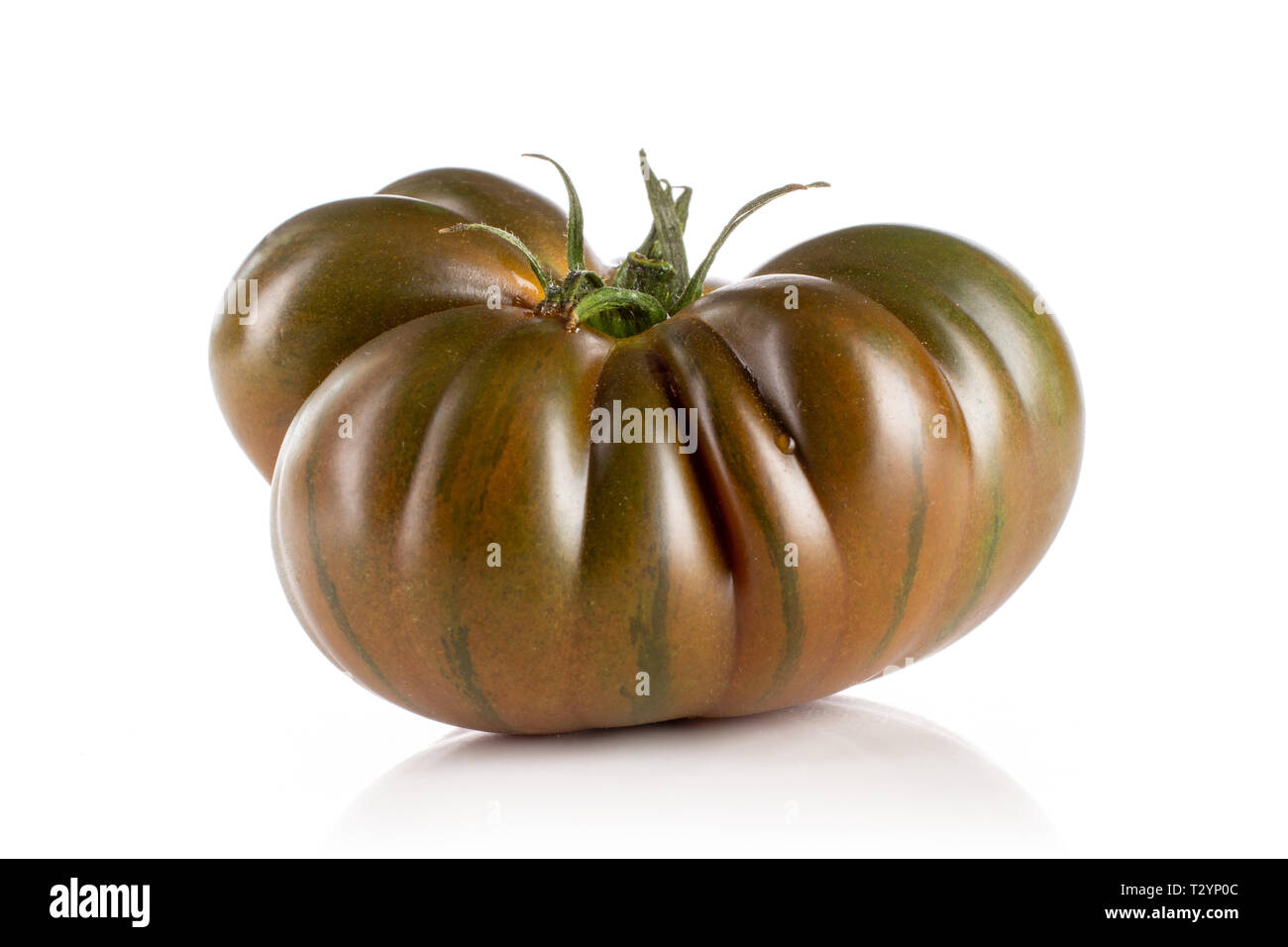 One whole fresh tomato primora isolated on white background Stock Photo ...