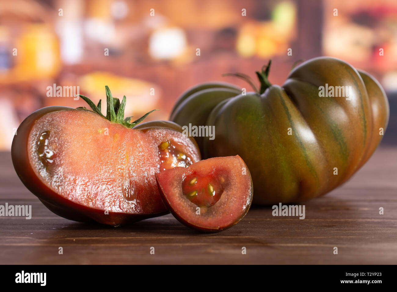 Group of one whole one half one slice of fresh tomato primora in a ...