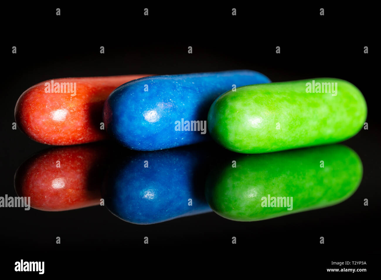 Group of three whole sweet licorice comfit red, green and blue (rgb ...