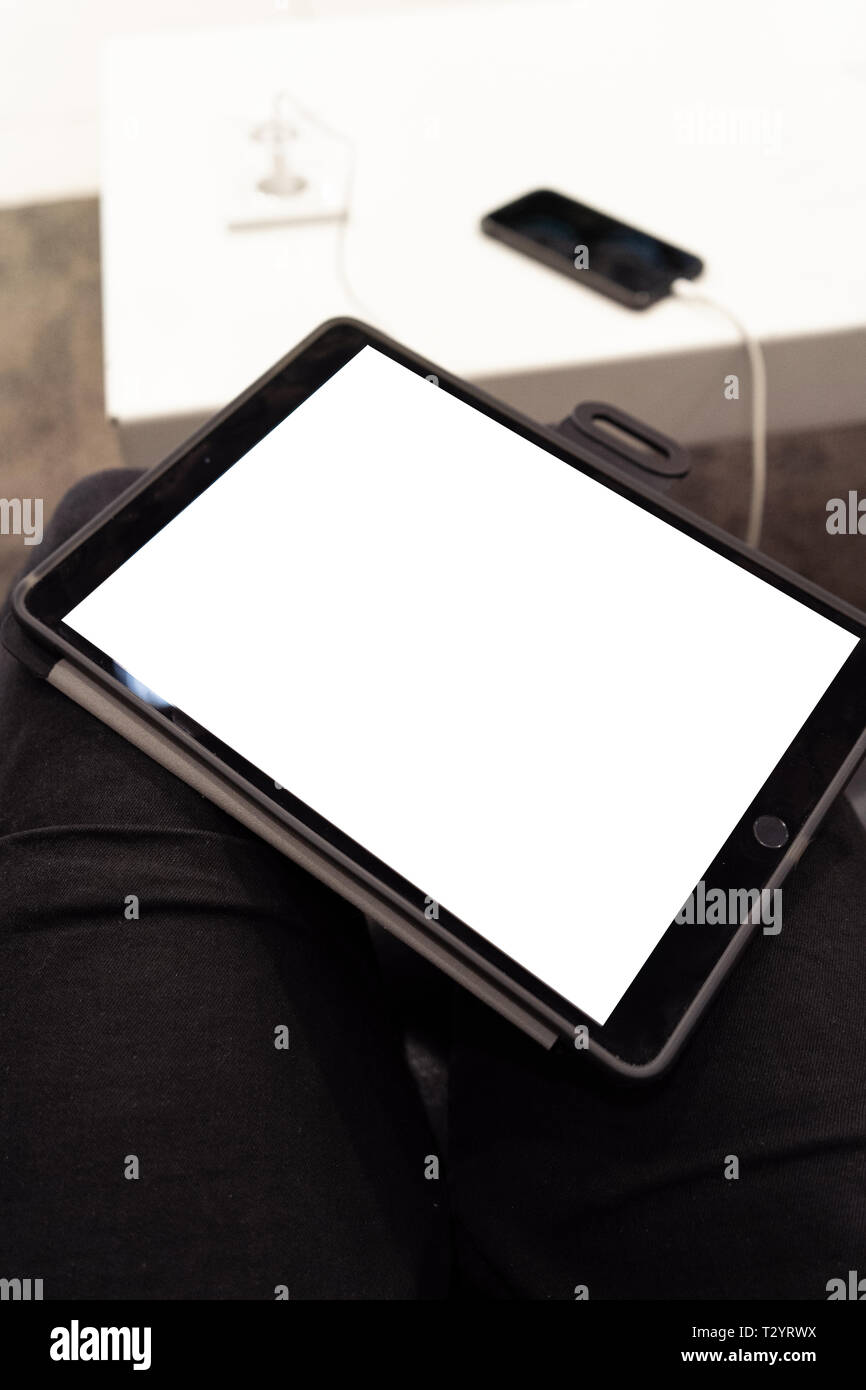 Real life use of tablet with free copy space for your ad and text ...