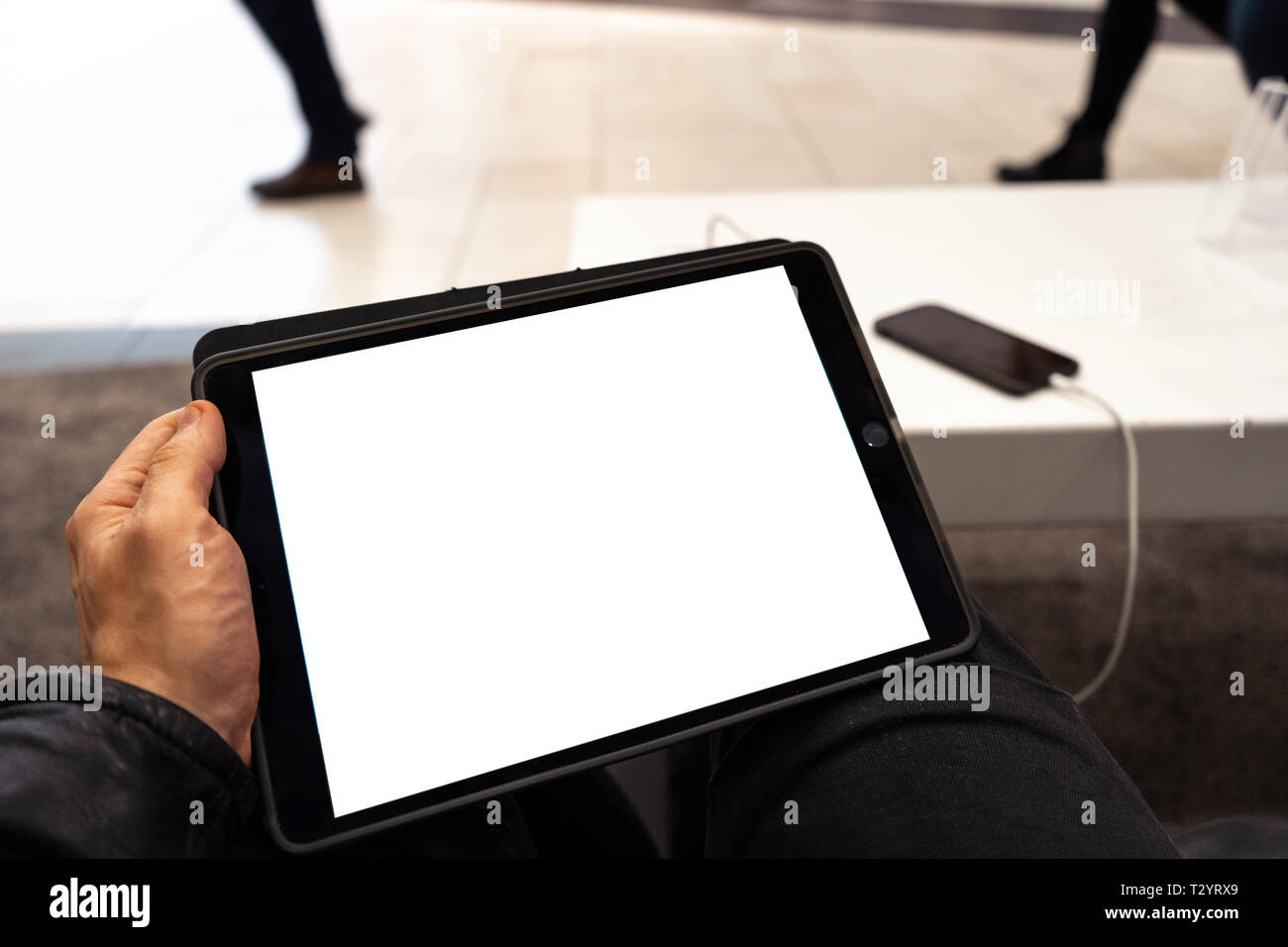 Real life use of tablet with free copy space for your ad and text ...