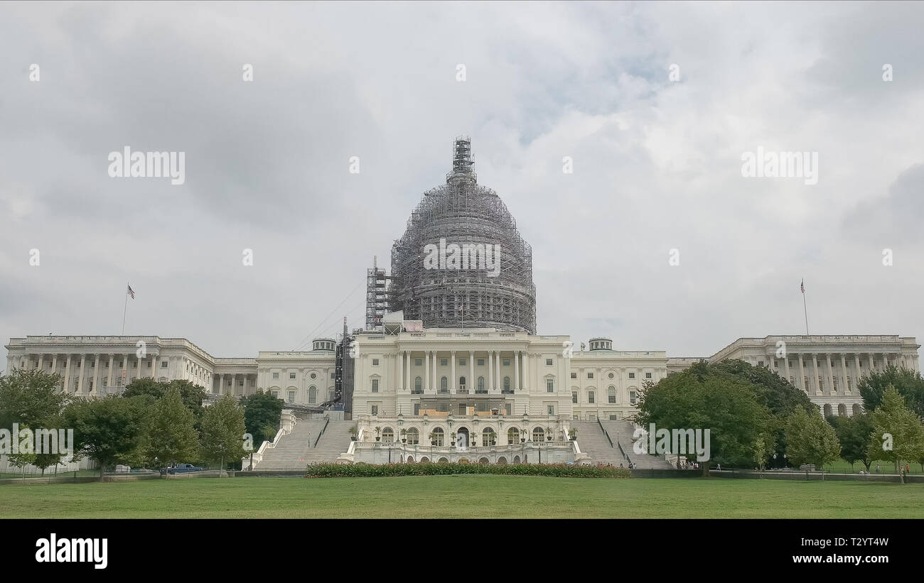 the exterior of the us capitol undergoing renovations in washington, dc ...