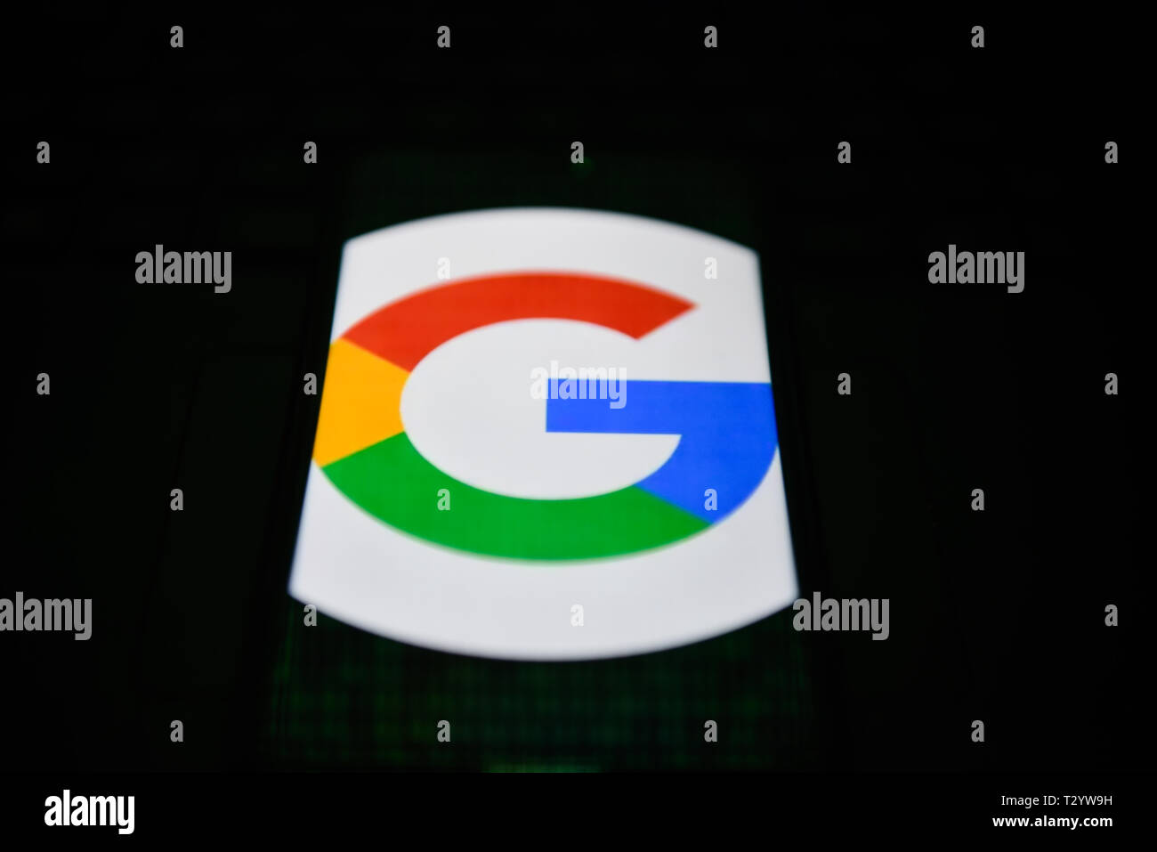 In this photo illustration a Google logo seen displayed on a smart ...