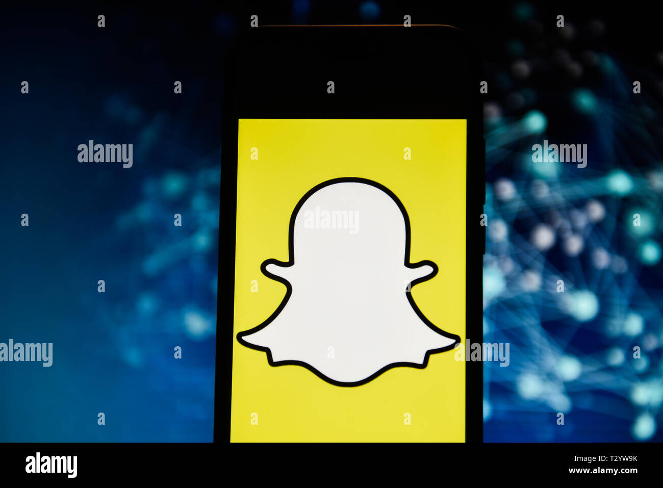 In this photo illustration an Snapchat logo seen displayed on a smart ...