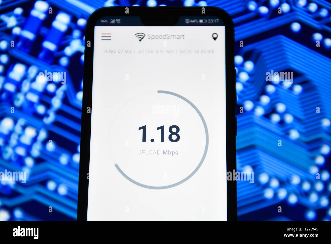 In this photo illustration an upload wifi speed number is displayed on ...