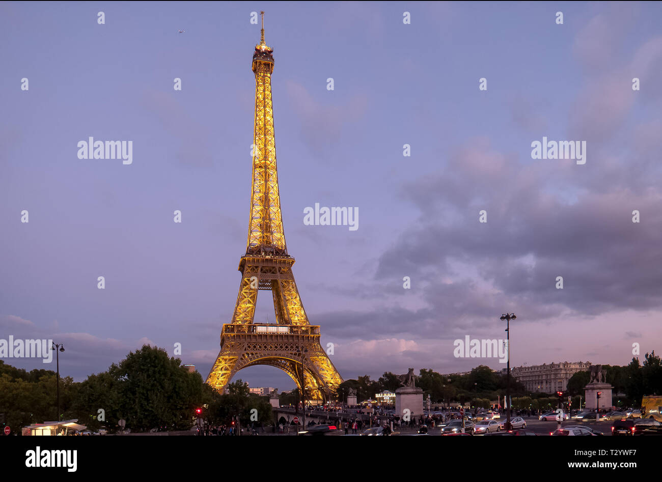 PARIS, FRANCE- SEPTEMBER 20, 2015: a dusk shot of the eiffel tower, one ...