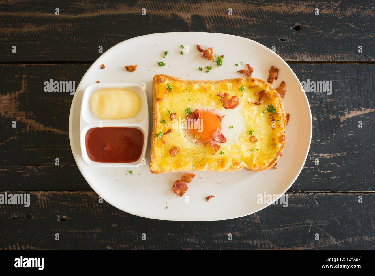 Egg Yolk Bacon Ham Cheese Toast and Coriander. Breakfast egg yolk bacon ...