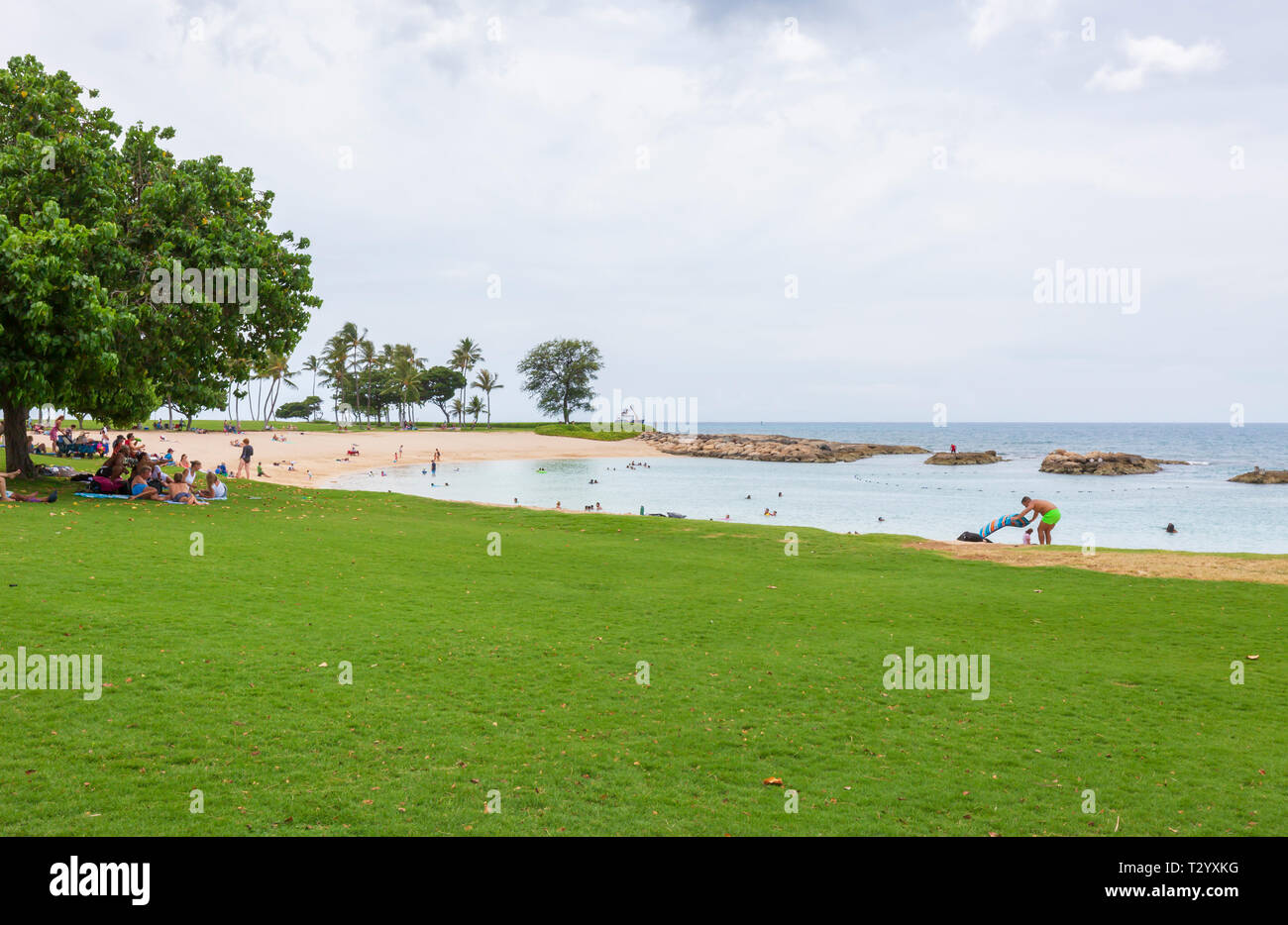 People enjoying the Beach at Ko olina Lagoons Beach park on Oahu Hawaii ...