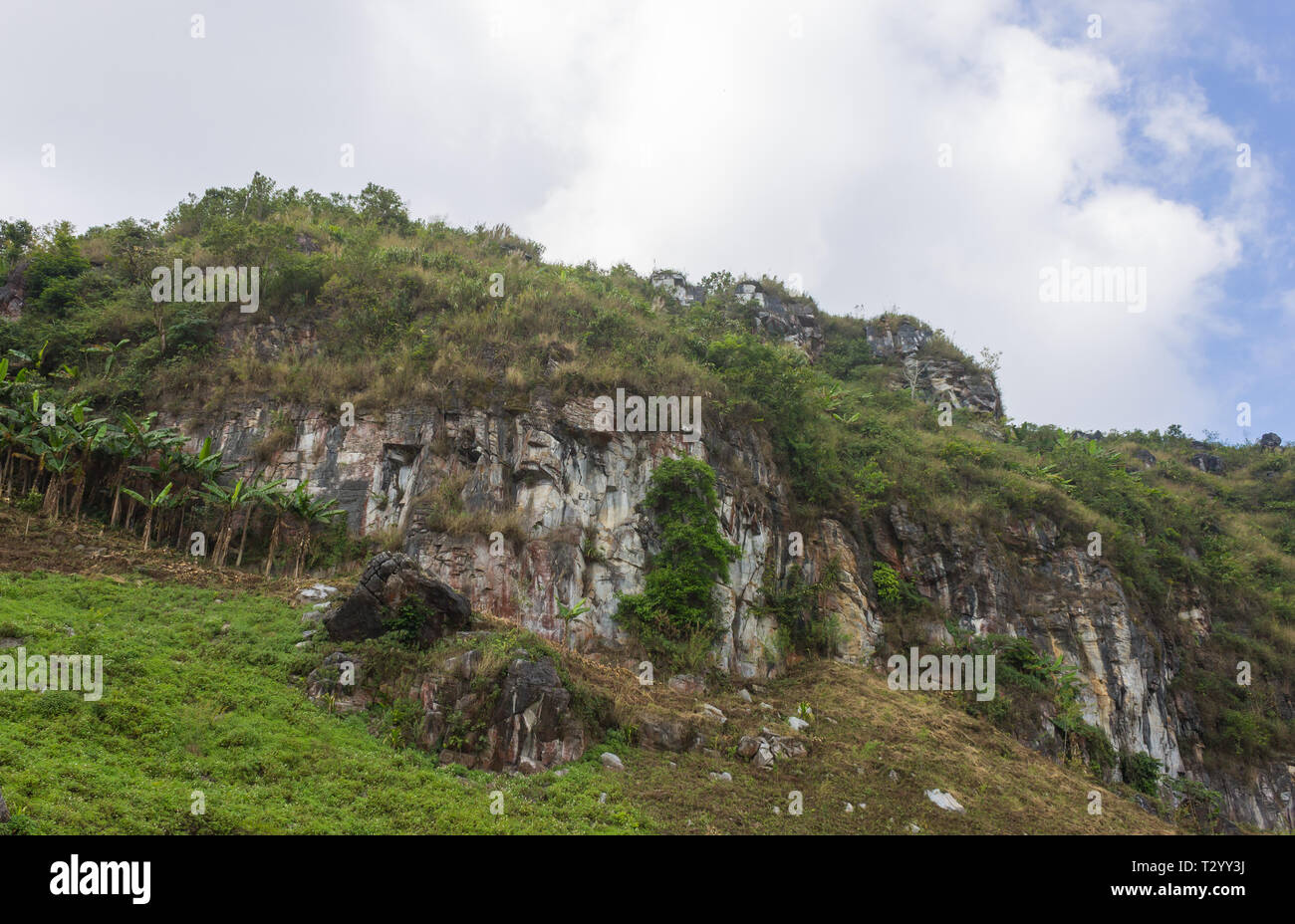 Stone or Rock Mountain with Grass Sky and Cloud on Phu Chi Fa Forest ...