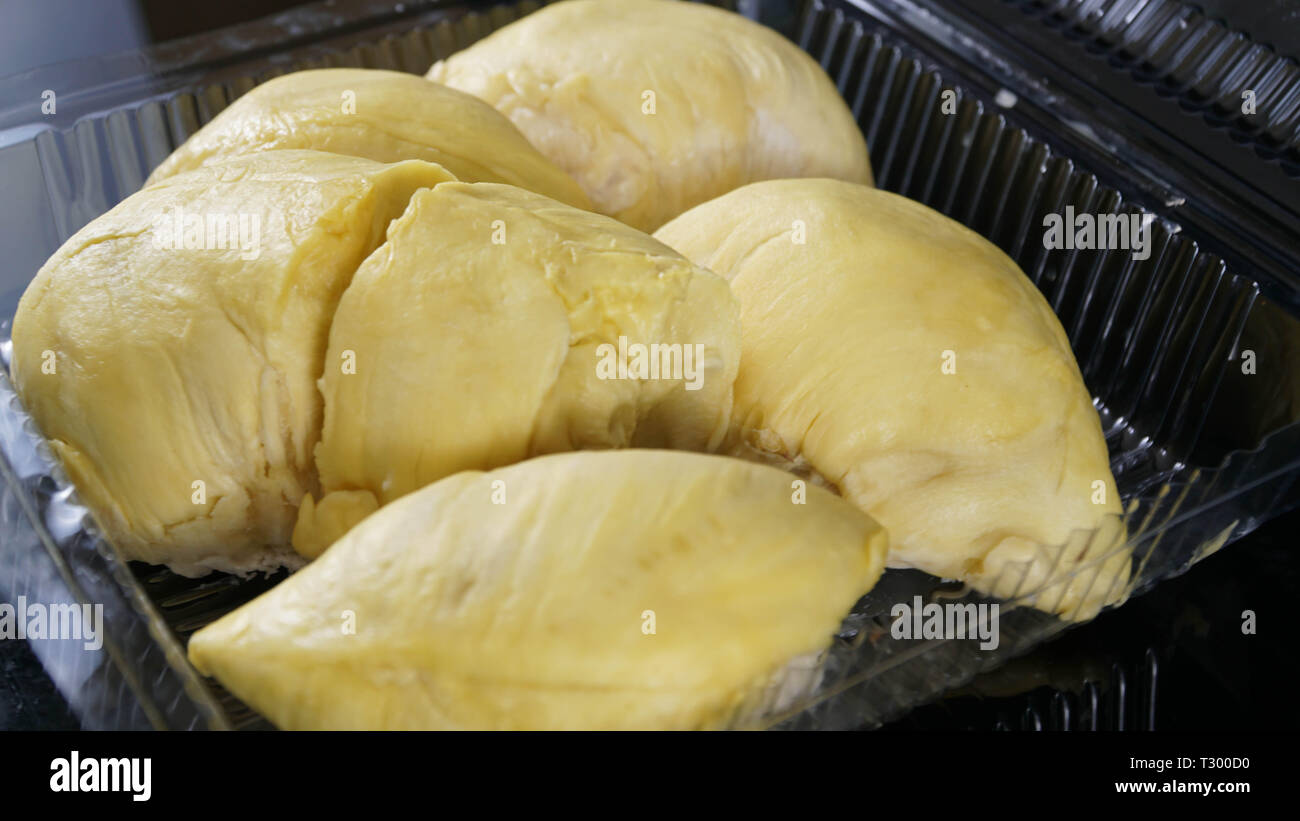 close up of one opened plastic container packaging with big yellow ...