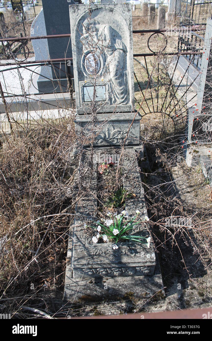 ancient public city cemetery with traditional europen headstones on ...