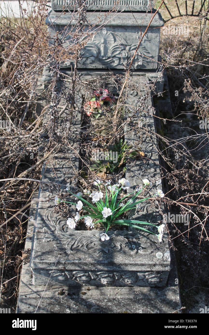 ancient public city cemetery with traditional europen headstones on ...