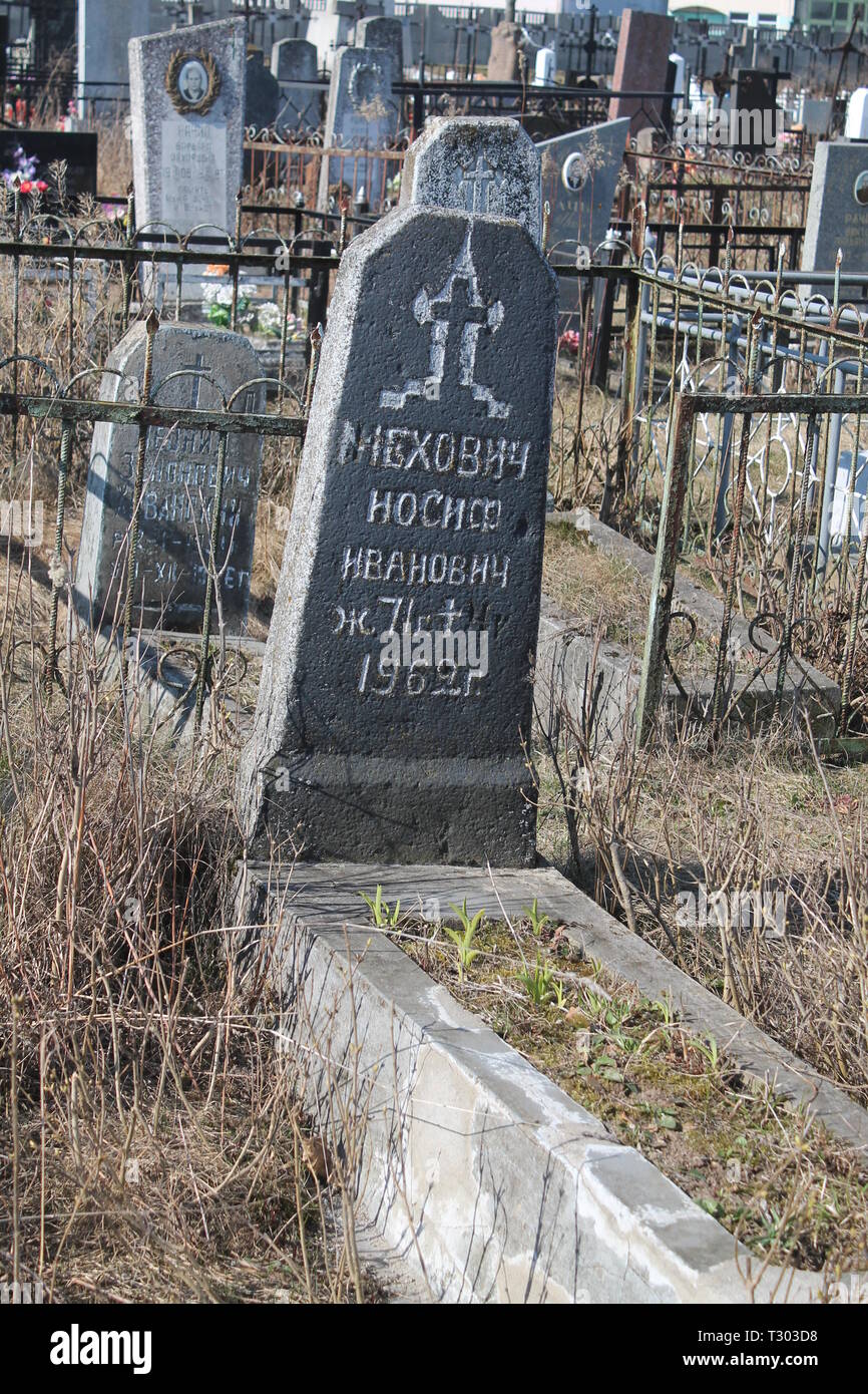 ancient public city cemetery with traditional europen headstones on ...