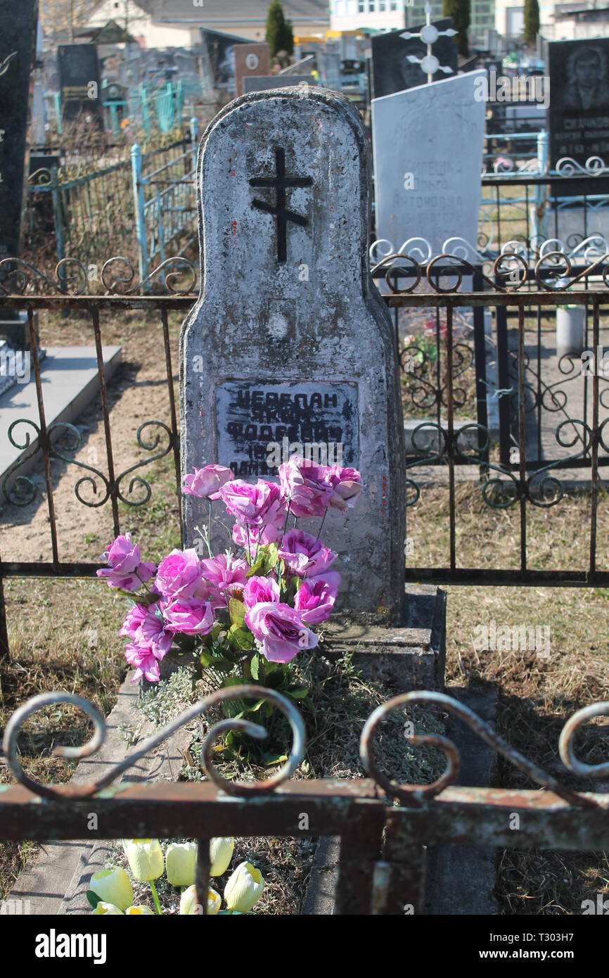ancient public city cemetery with traditional europen headstones on ...
