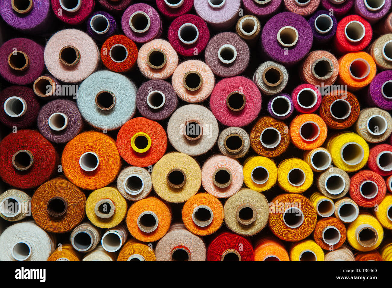 A set of threads of different colors. Many threads for sewing and ...