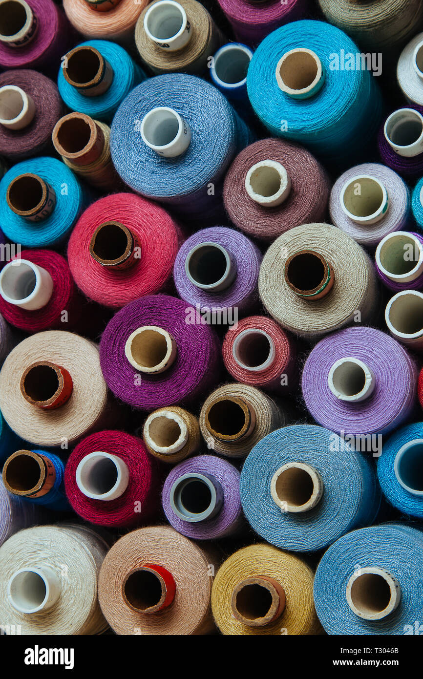 A set of threads of different colors. Many threads for sewing and ...