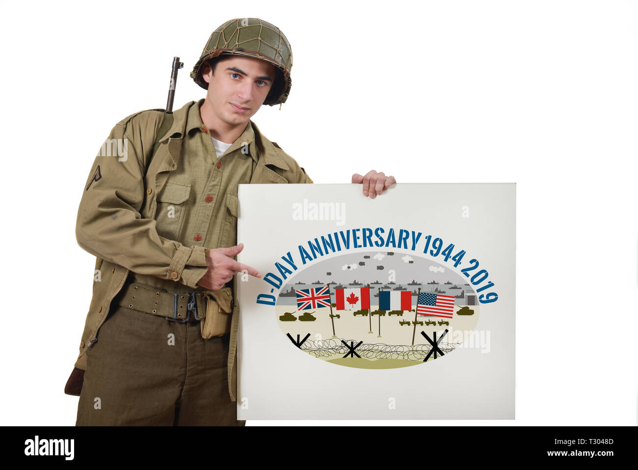 young American soldier with M1 helmet shows a signs Stock Photo - Alamy