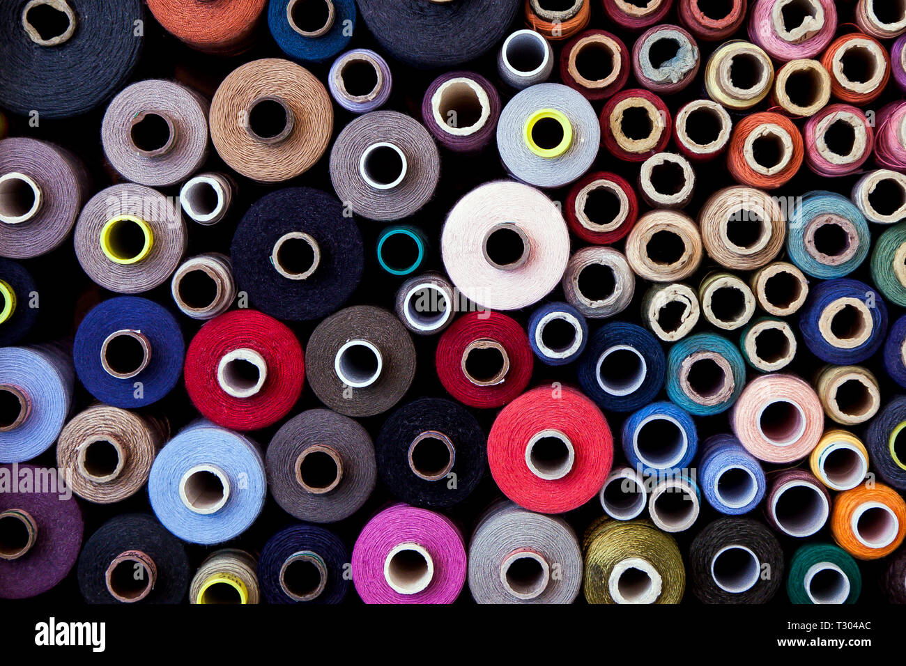 A set of threads of different colors. Many threads for sewing and ...