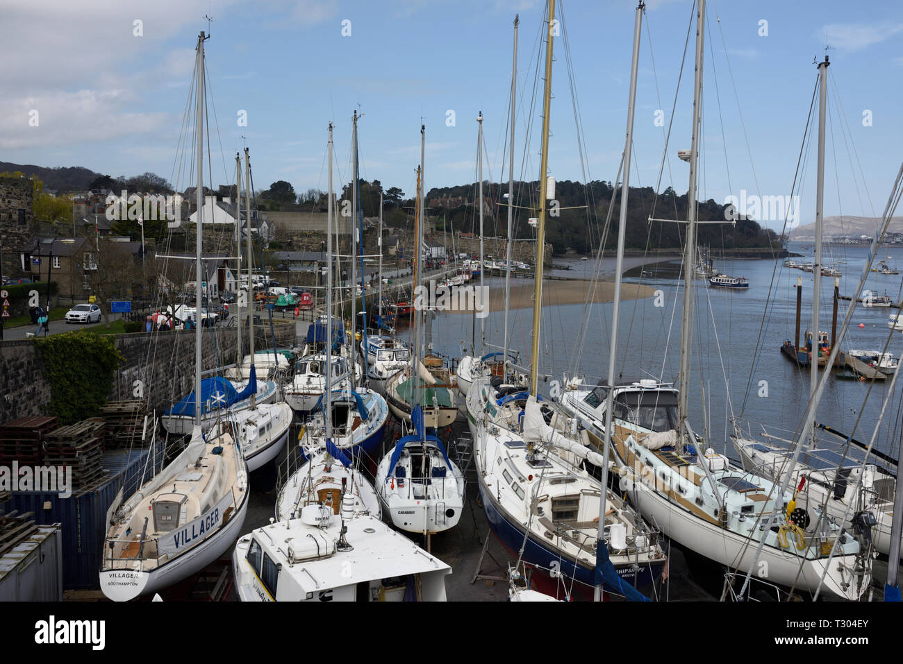 Elevated view of fibreglass sailing boats and masts out of water, on ...