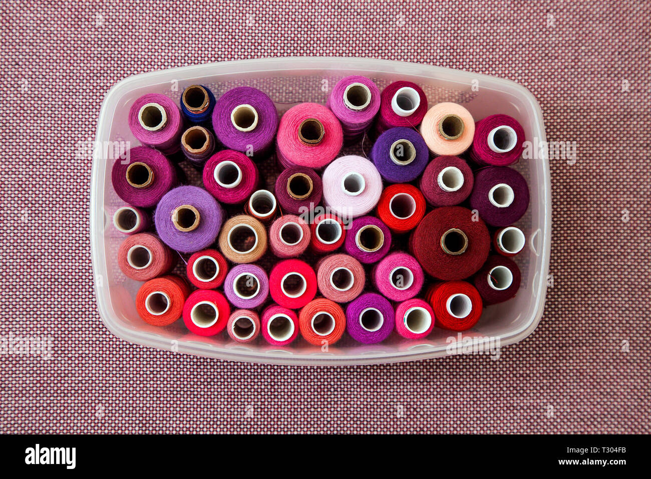 A set of threads of different colors. Many threads for sewing and ...