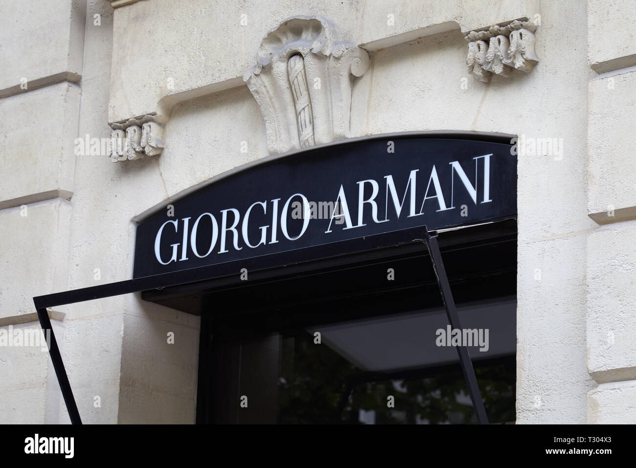 PARIS, FRANCE - JULY 22, 2017: Giorgio Armani black and white sign ...