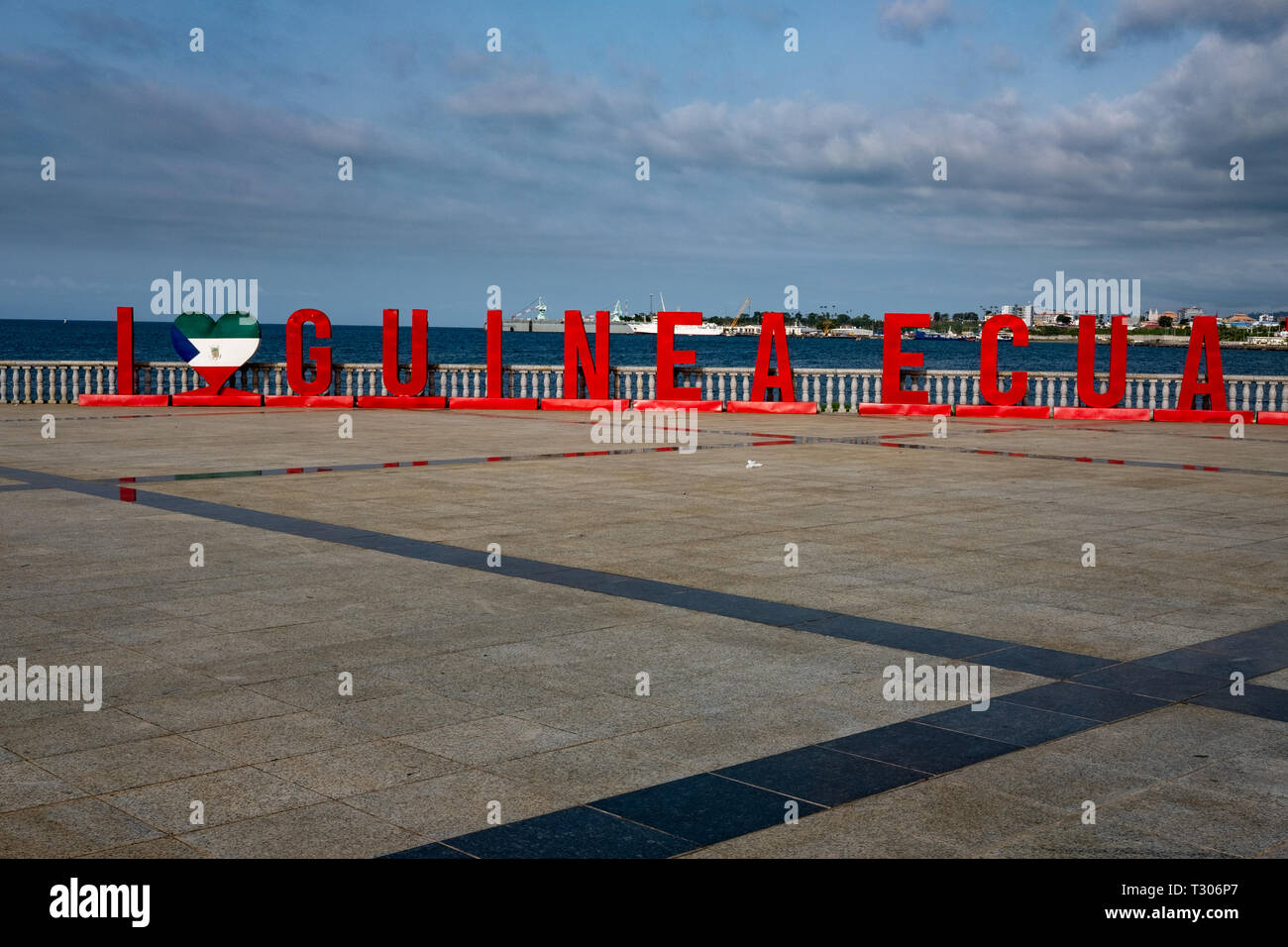A red sign reading "I love Equatorial Guinea" on the shore of Malabo ...