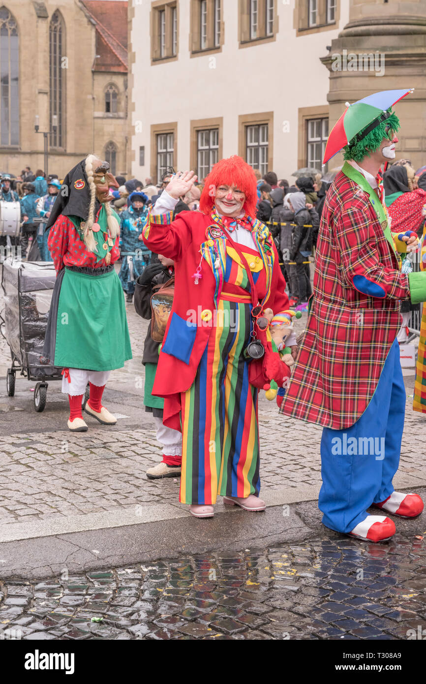 STUTTGART, GERMANY - MARCH 5: aged female clown in parade under light ...