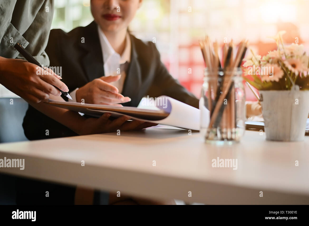 Asian business woman analyzing progress hi-res stock photography and ...