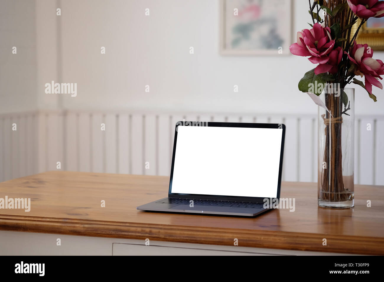Mockup laptop computer and rose flower on wooden office desk Stock ...