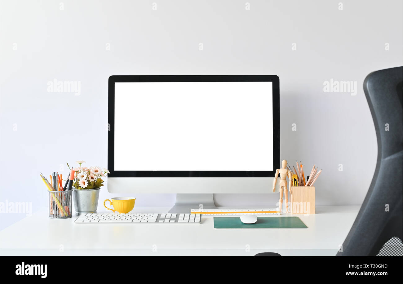 Workspace computer and office supplies on white office desk Stock Photo ...