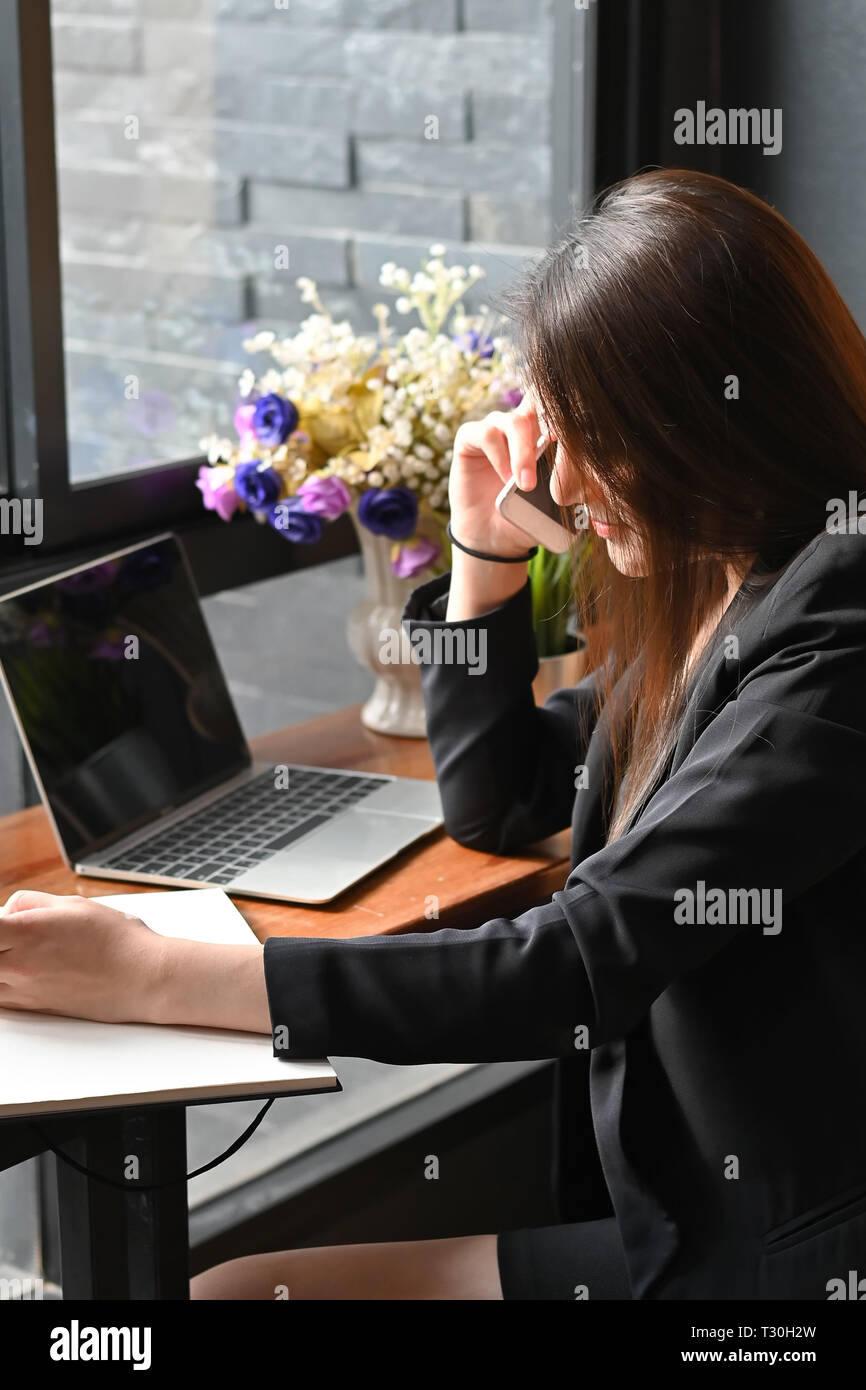 Secretary women calling with mobile phone in business office Stock ...